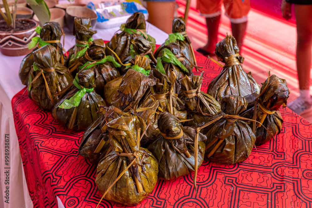 Chicken juane wrapped in bijao leaves. Peruvian jungle food, in all its ...