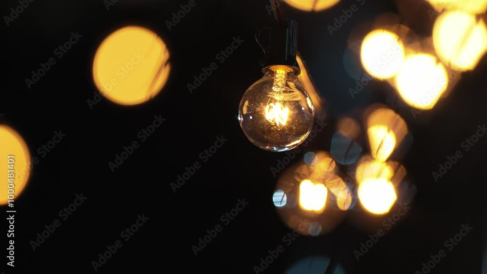 Sphere Light bulb, represent unity and harmony, on electricity wire ...