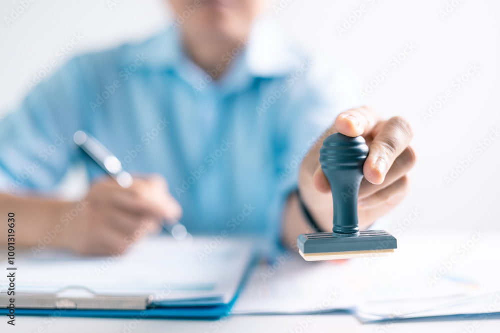 Notary placed their stamp of approval on the document as the lawyer and ...