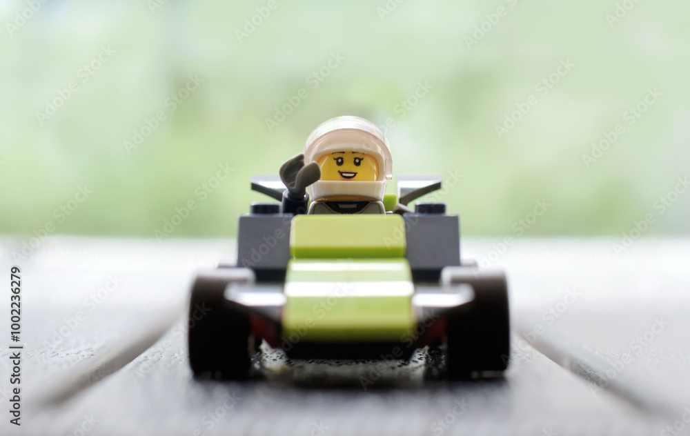 Lego minifigure cute racer in cart. Editorial illustrative image of ...