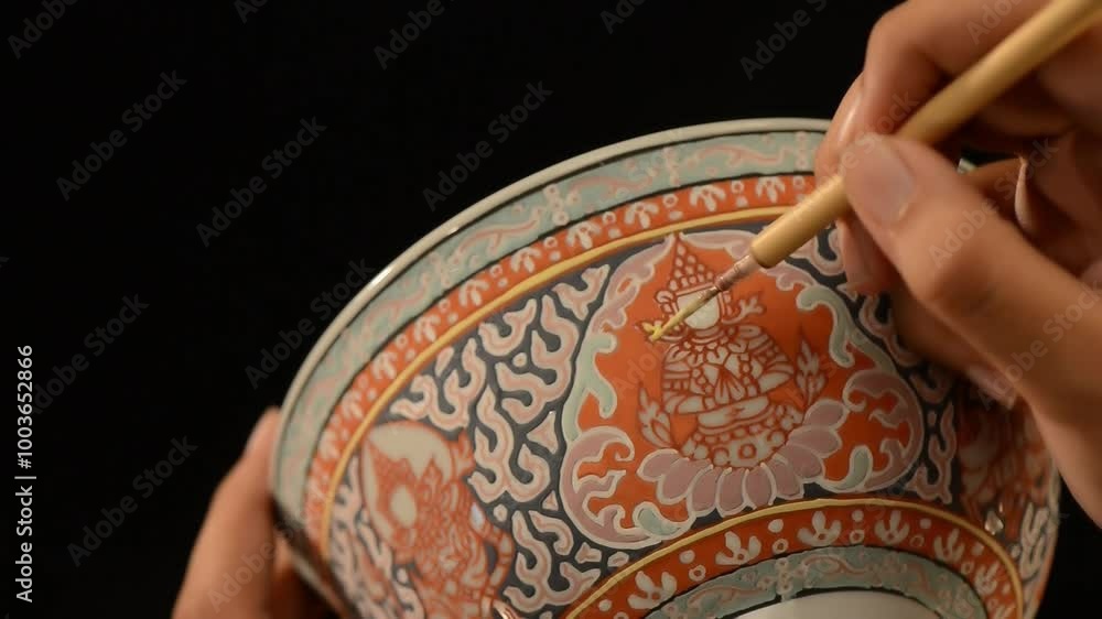 Thai Benjarong porcelain before glazing it and make a final firing. The ...