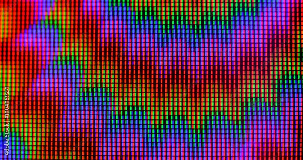 Extreme macro view of 4K LED matrix red, blue, and green sub-pixels ...