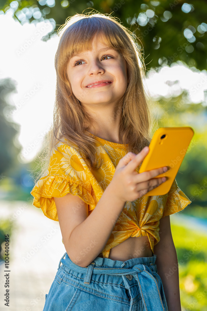 Preteen child kid using smartphone typing text answering messages ...