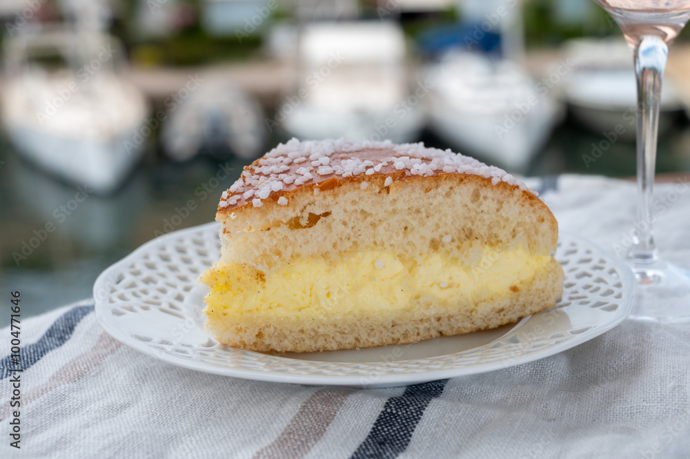 Cake of French Riviera, Tarte Tropezienne cake in yacht harbour of Port ...