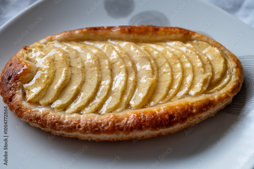 Poster French fresh baked sweet puff pastry with fresh apple fruits in ...
