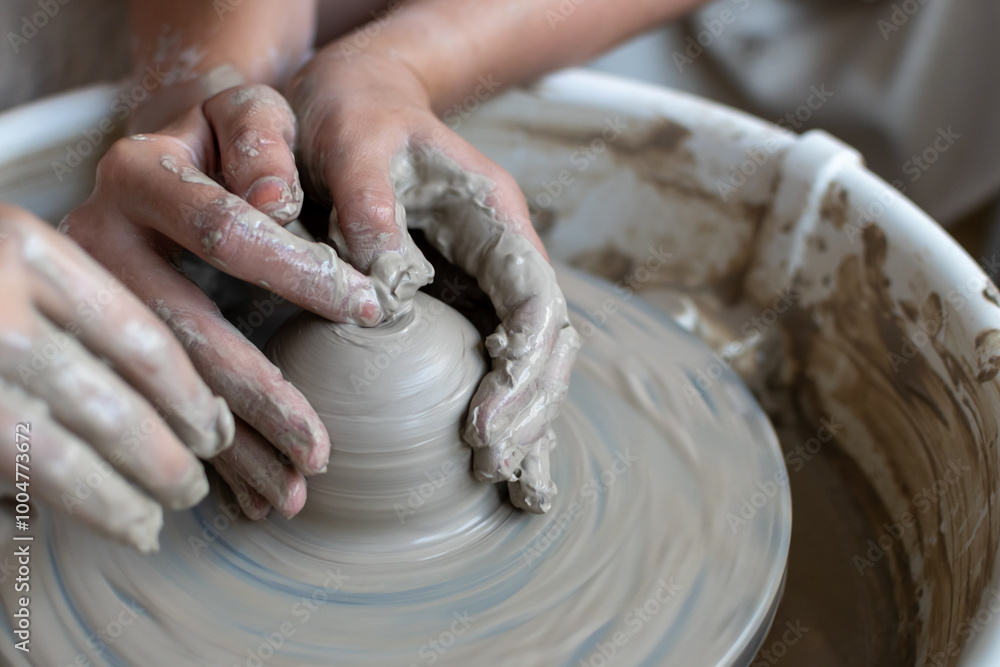 Making of mud pot on potters wheel during workshop in art ceramic ...