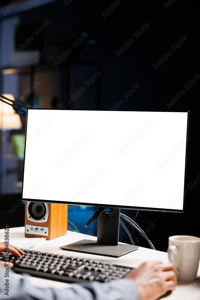 African american man staring at white screen on computer, working from ...