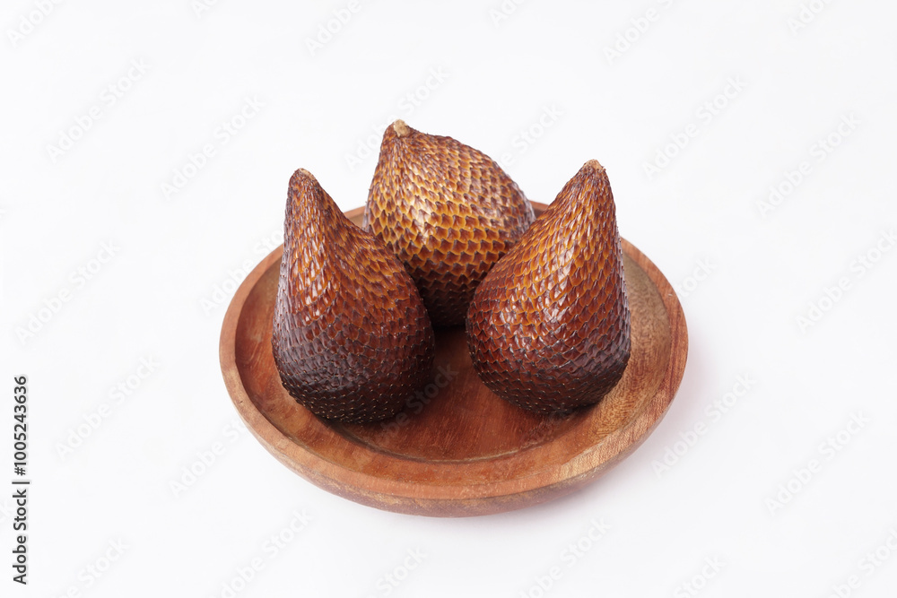 Snake fruit isolated on white background. one of which has its skin ...