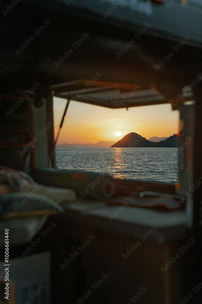 sunset through the window in the roof tent, van life, camping in Greece ...
