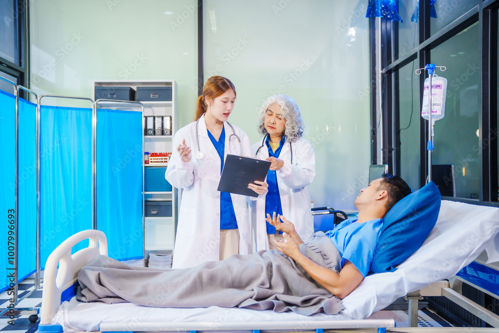 A middle-aged man lies bedridden on hospital bed, closely monitored by ...
