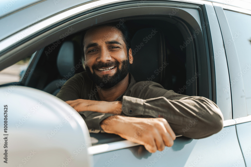 Happy driver, Indian man smiling while sitting inside his new car Stock ...