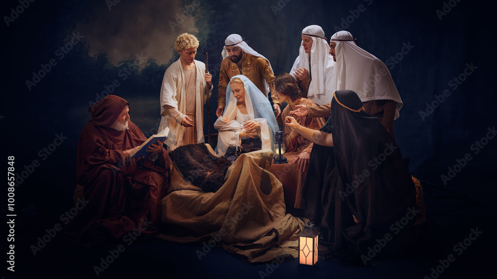 Nativity scene with Mary, Joseph, shepherds and angel around baby Jesus ...