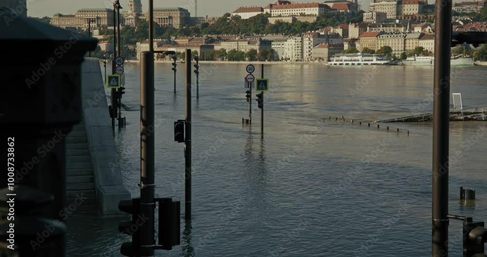 Traffic lights and signs submerged in water as the city streets flood ...