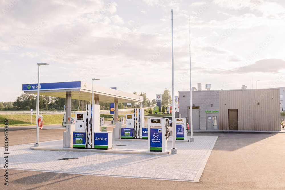 A modern fuel station with multiple pumps for AdBlue, diesel, and ...