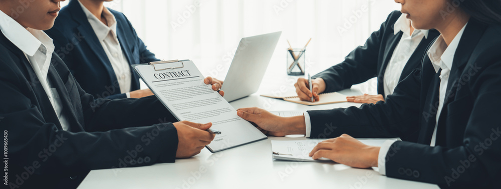 Two business executive in boardroom discuss term and company merging ...