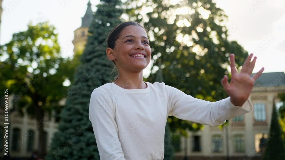 Indian pretty little girl child waving hand hello greeting classmate ...