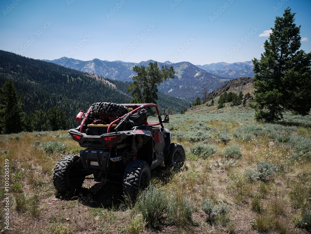 UTV parked on mountain top in Sawtooth national forest overlooking view ...