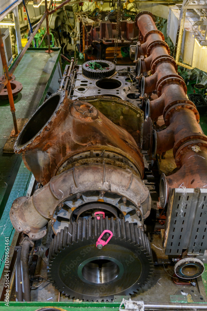 Main engine repairing. Inside engine room on big ship. Marine engine on ...