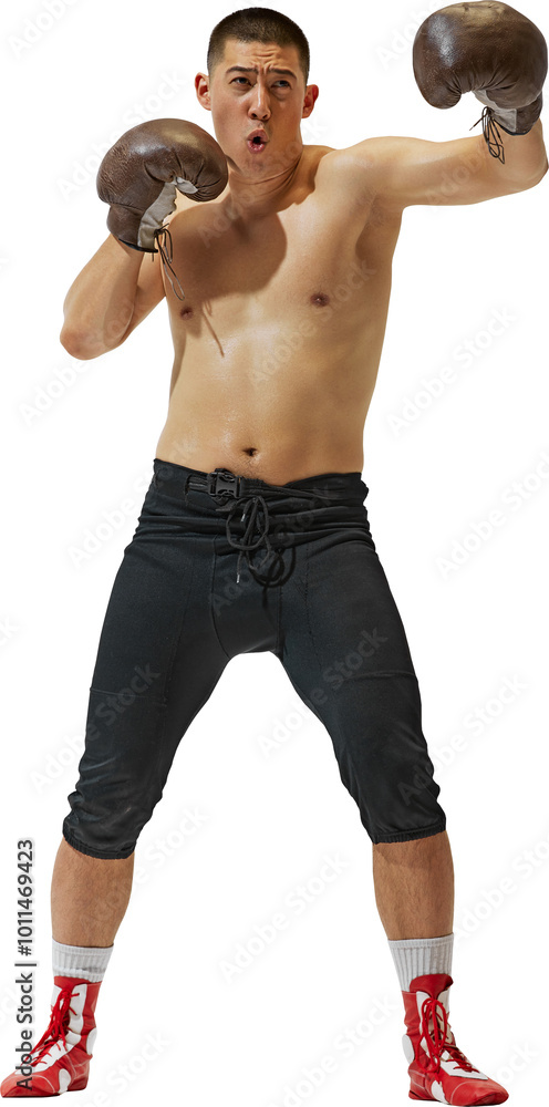 Shirtless emotional young man, young boxer training hard, captured mid ...