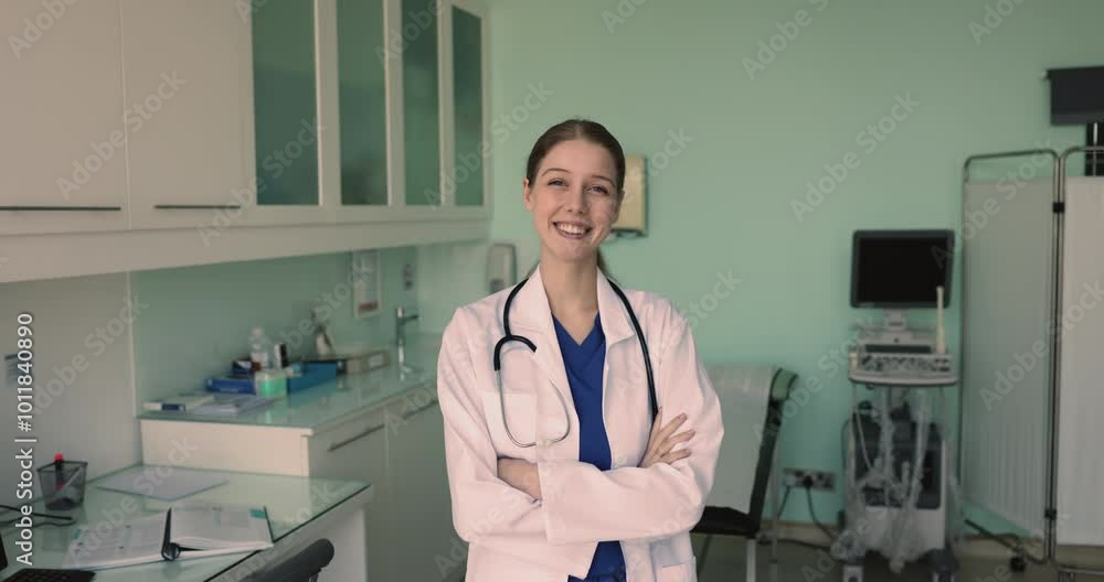 Young Latina female therapist, internist wear uniform posing with arms ...