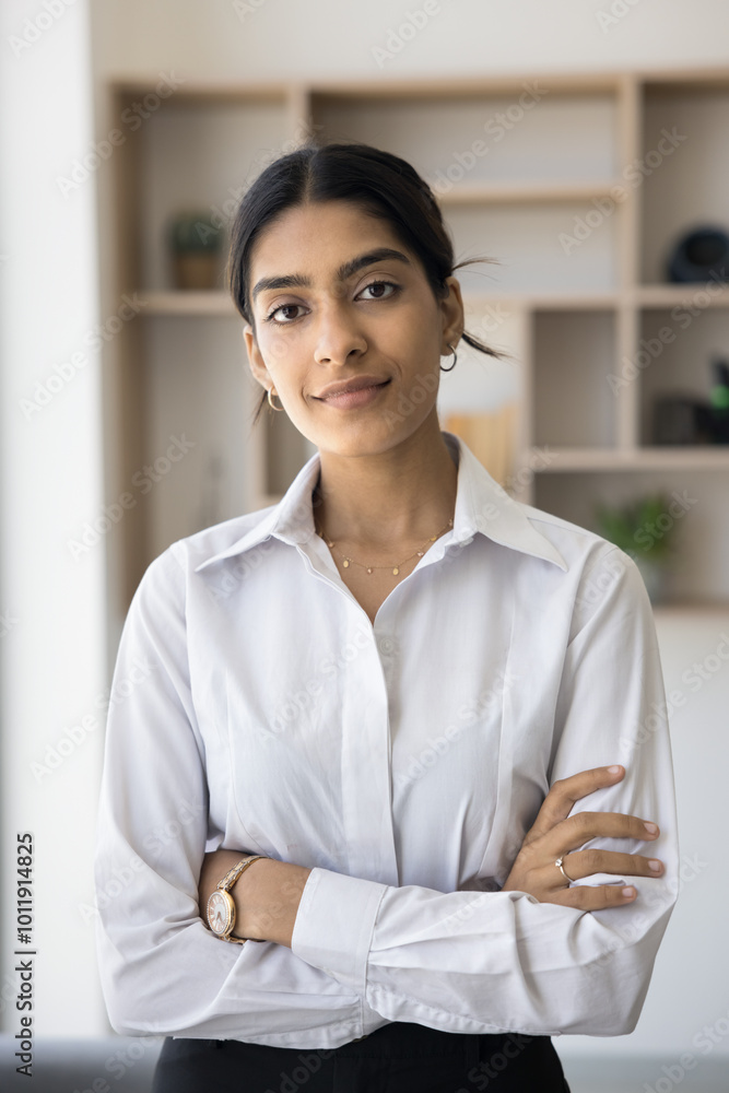 Vertical portrait of happy young business lady of Indian ethnicity ...