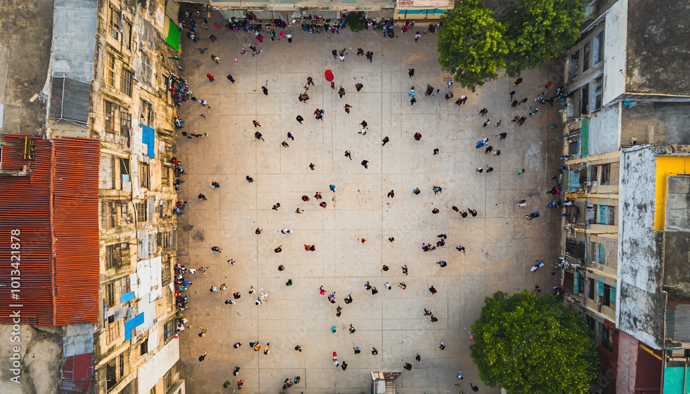 Capture people from directly above, using rooftops or drones to create ...