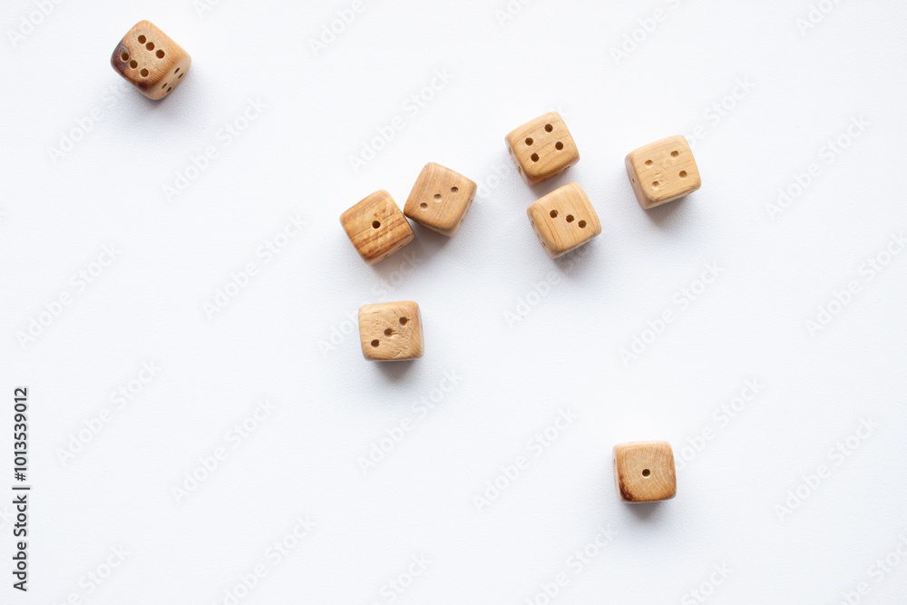 These are photos of wooden dice on a white background. They include ...
