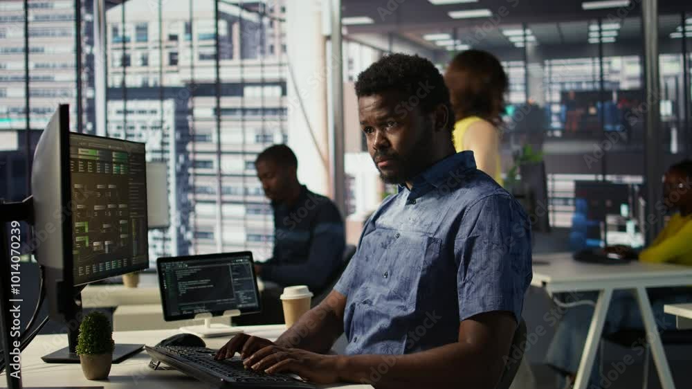 Man checking paperwork details on computer screen, solving tasks ...