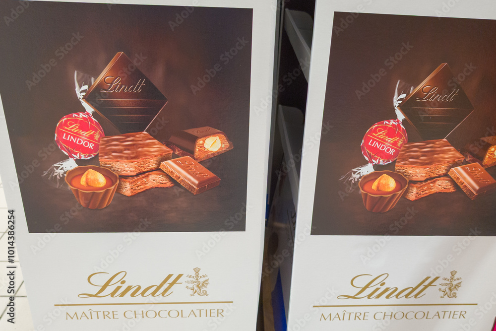 Lindt logo sign and text brand on display store swiss bar chocolate and ...