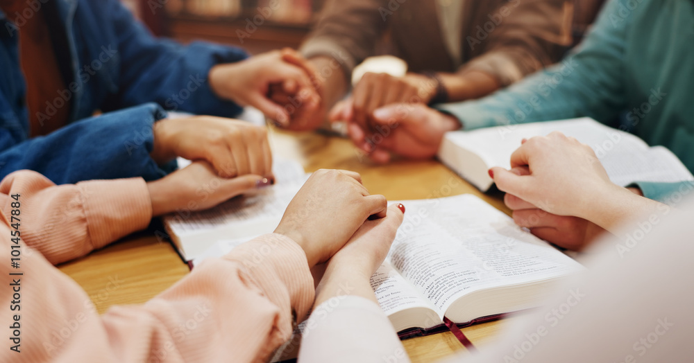 Bible study, holding hands and group with faith, praying and friends ...