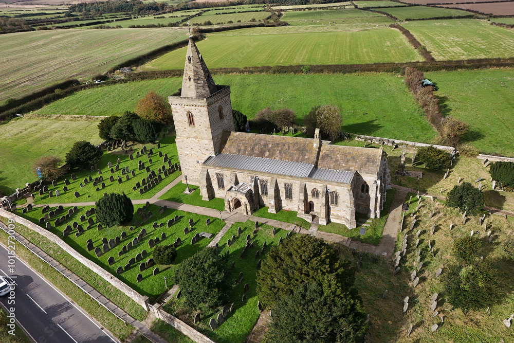 aerial view of Church of St Oswald, Lythe, is the parish church for the ...