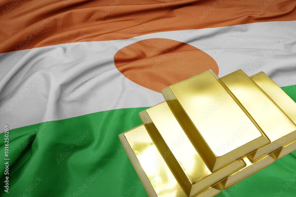 shining golden bullions on the niger flag background. gold reserves ...