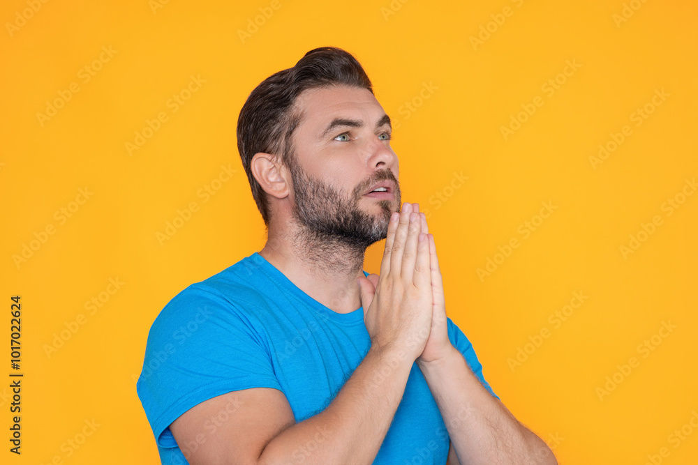 Man praying. Isolated portrait of male pray. Guy thinking intensely ...
