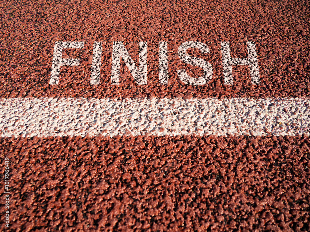 Finish line on asphalt. End of race. Inscription finish on ground ...