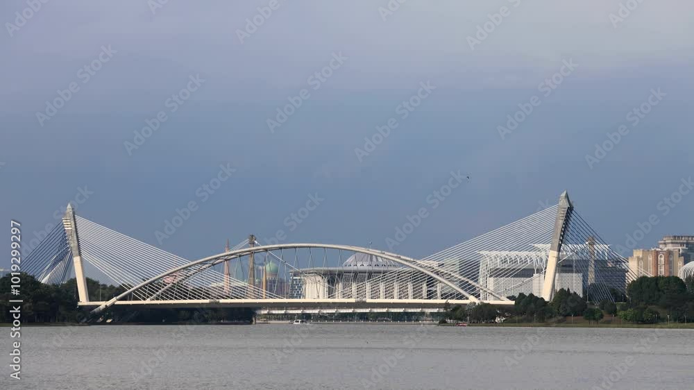 Suspension bridge across lake Putrajaya in Malaysian capitol city ...