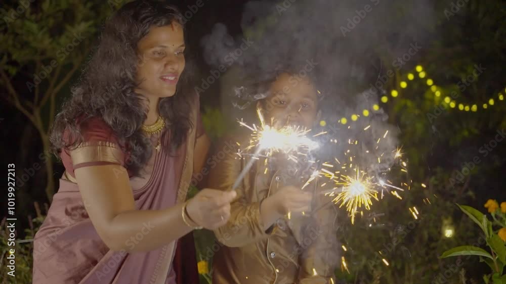 Diwali celebrating a Family Family Bursting Firecrackers in Diwali ...