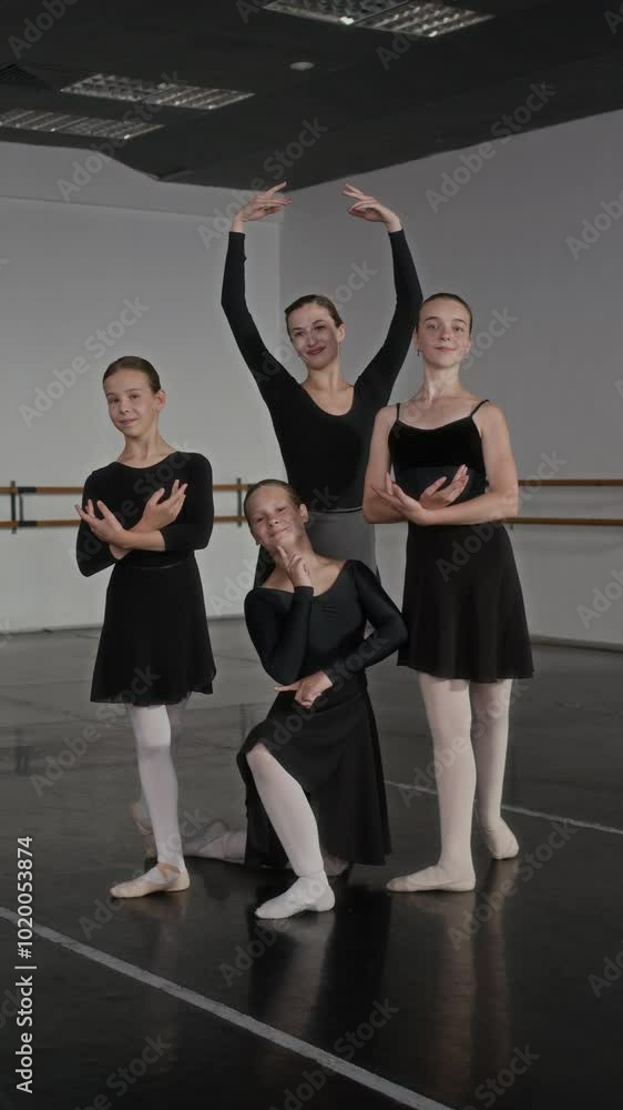 Vertical full length portrait of beautiful young female ballet ...