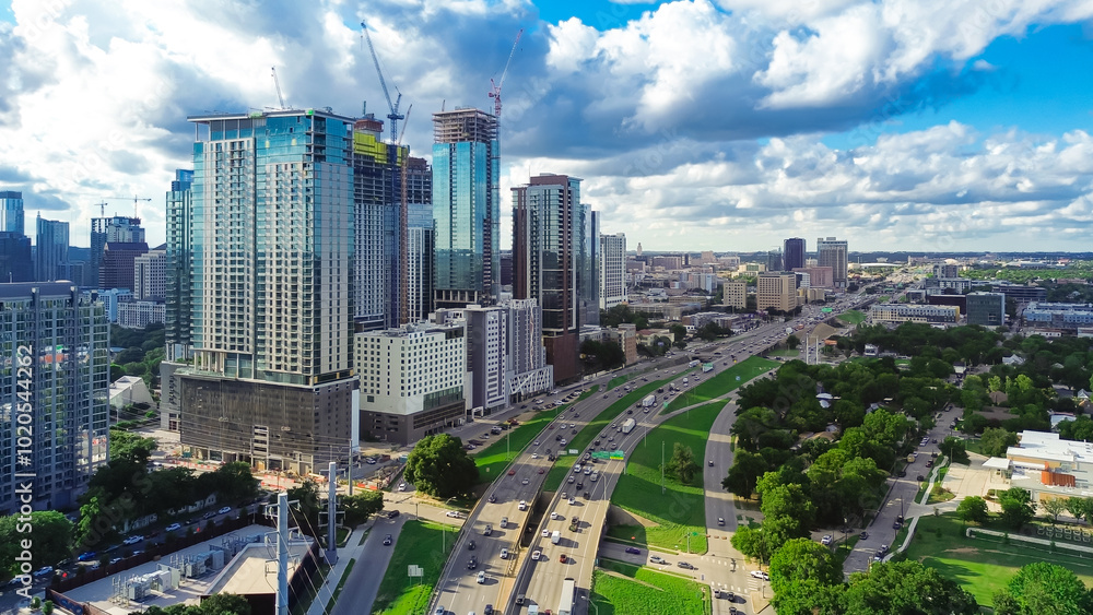 Busy peak hour traffic along Interstate I-35 downtown Austin skyscraper ...