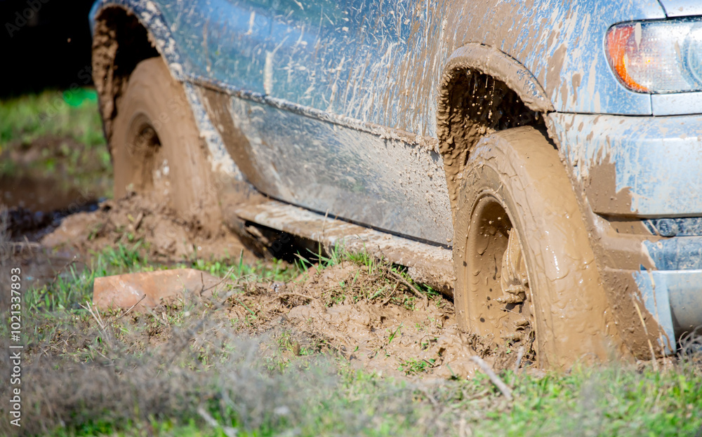 Car wheel stuck in mud, motorsport, mud tire testing. Off-road driving ...