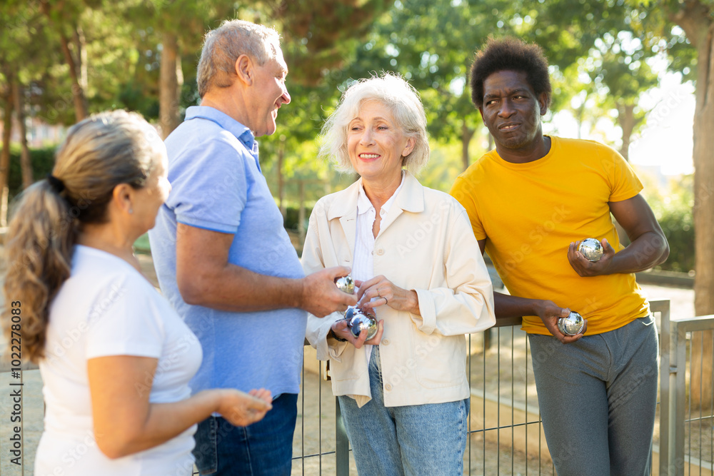 Portrait of multiracial mixed-age adult people standing side by side ...