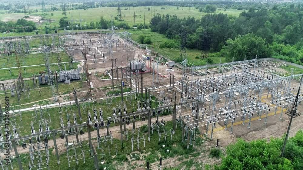High voltage electrical substation. View from flying drone. Power plant ...