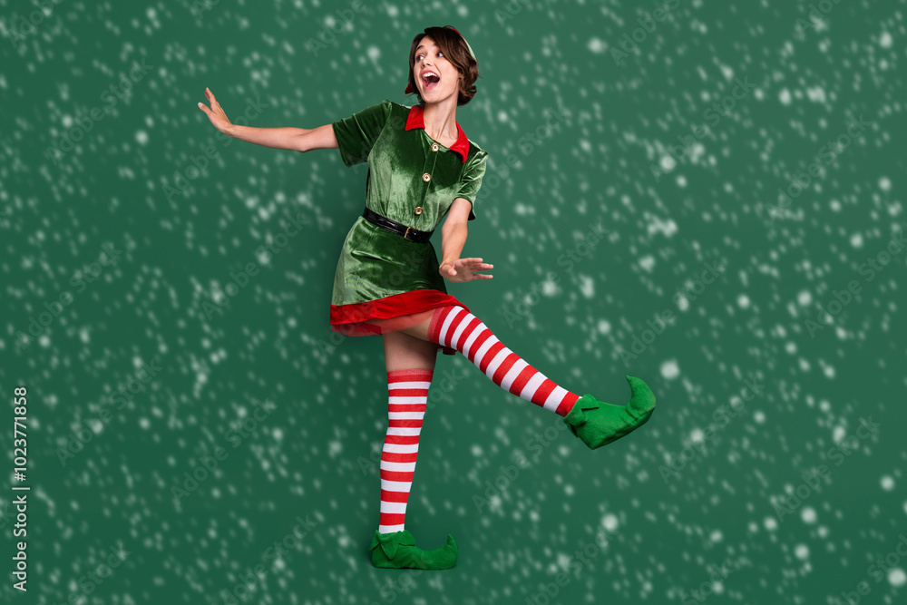 Full length body size view of attractive cheerful girl wearing elf look ...