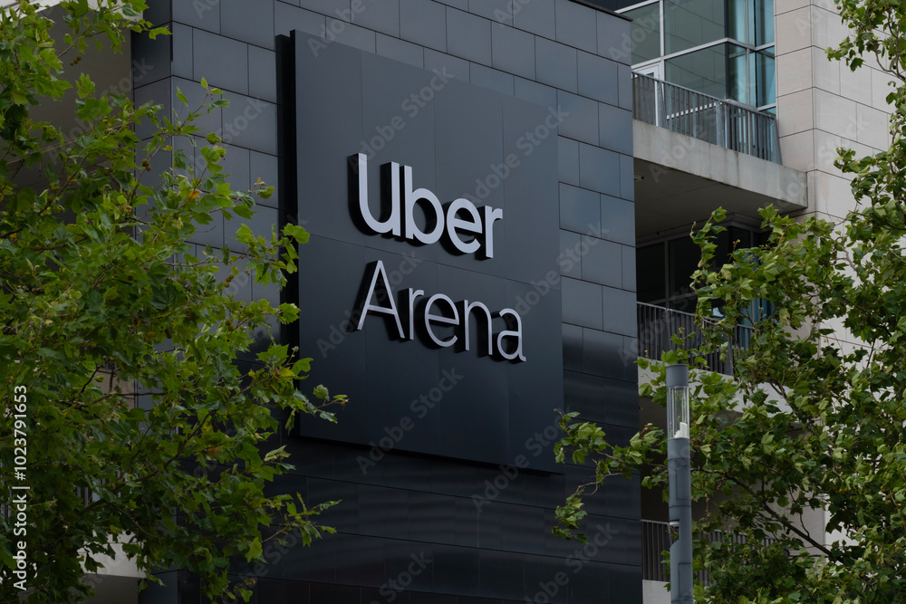Uber Eats Music Hall Advertising logo on modern building facade, fusion ...