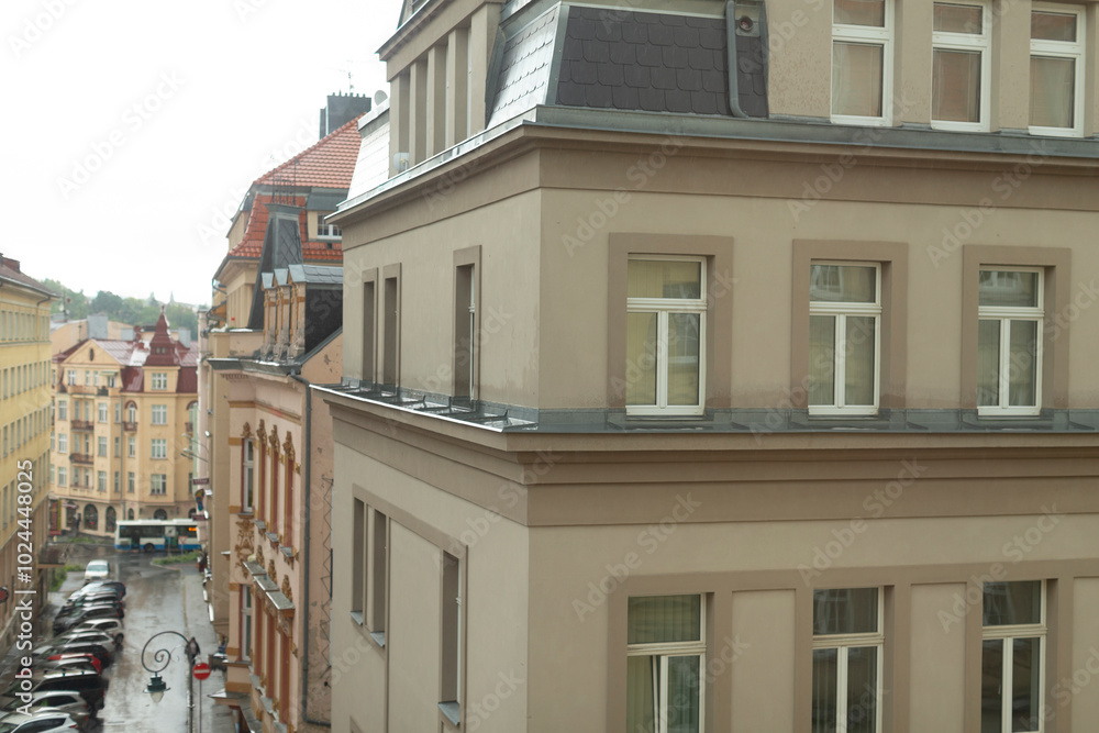 A large and spacious building featuring an abundance of windows ...