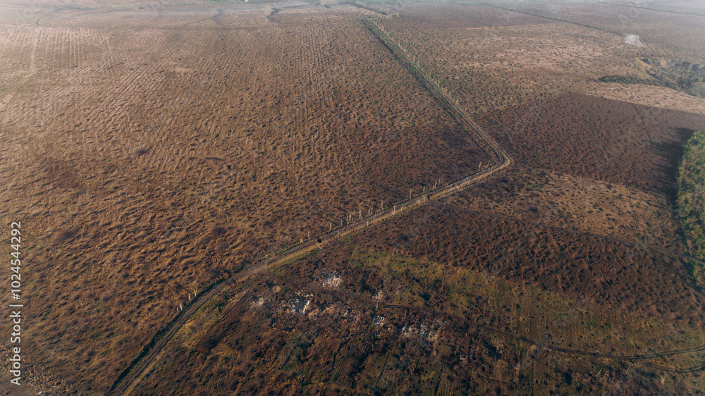 Battlefield view from above. Bomb craters on the ground. Lunar ...