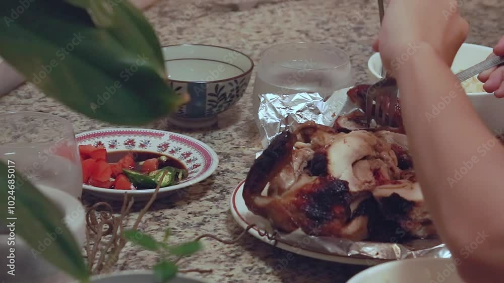 Eating lechon manok or Filipino roasted chicken and rice with soysauce ...