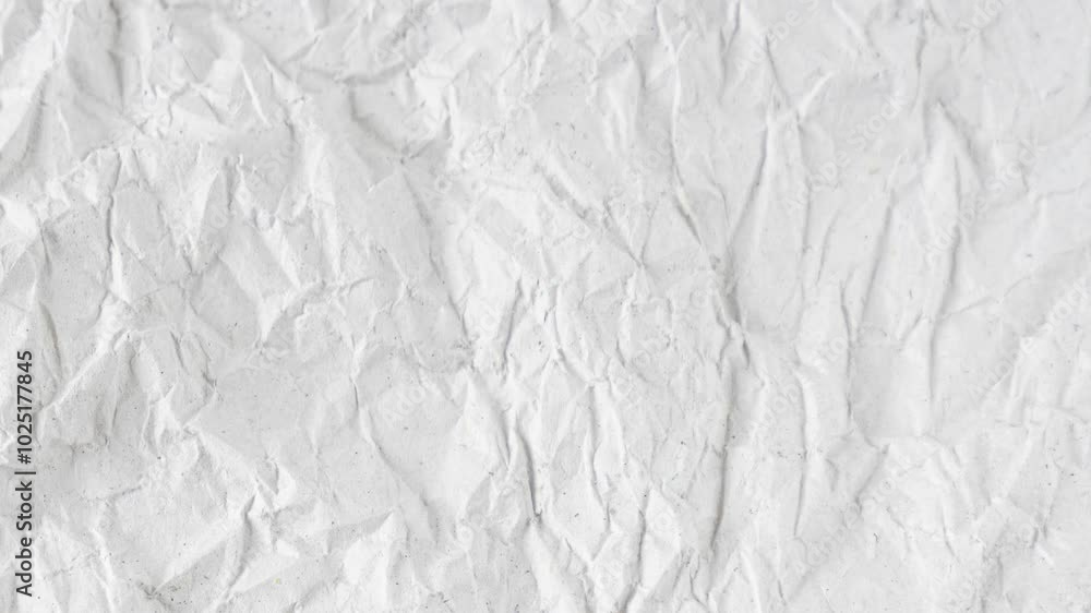 Animation of a white, crumpled sheet of paper in grunge style, looping ...