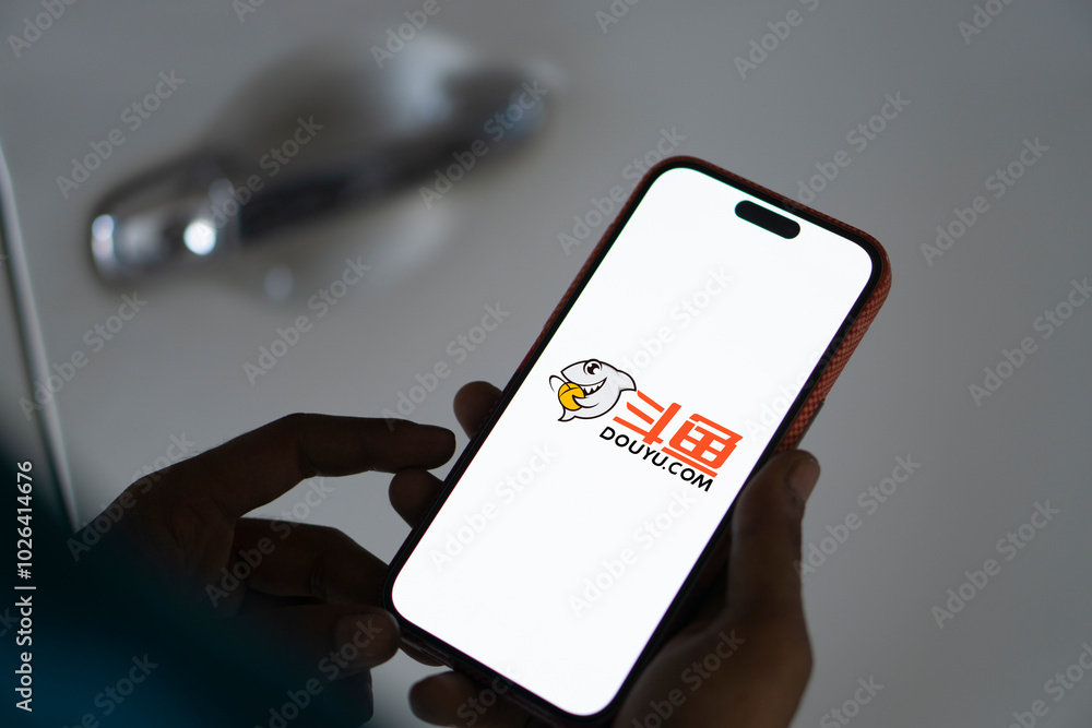 Dhaka, Bangladesh- 12 Oct 2024: DouYu logo is displayed on smartphone ...