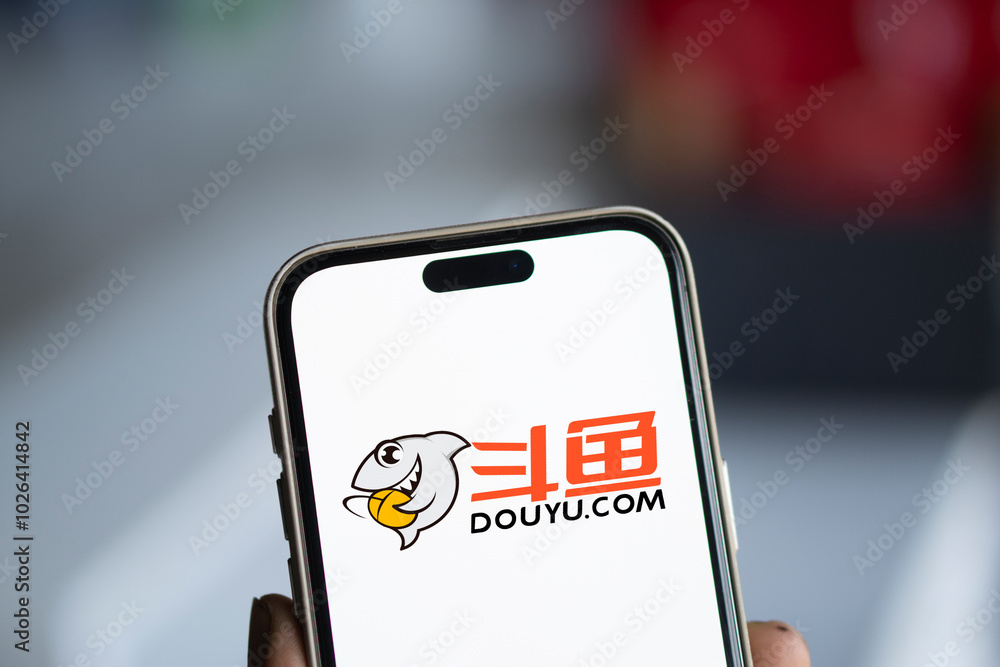 Dhaka, Bangladesh- 12 Oct 2024: DouYu logo is displayed on smartphone ...