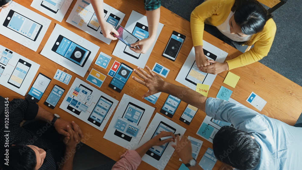 Top view of developer and designer shake hand together at meeting ...